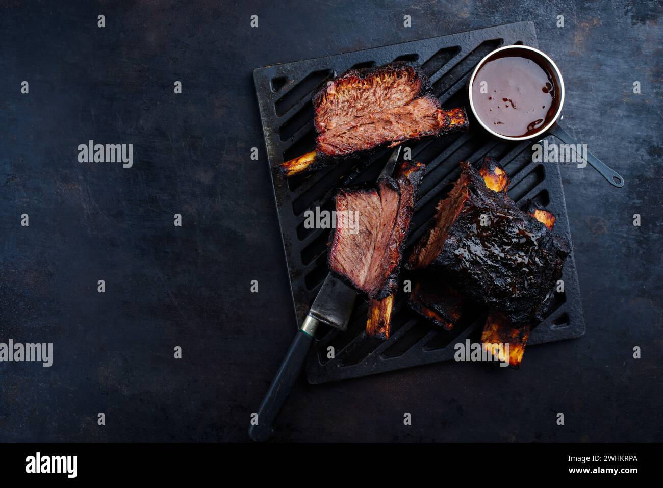 Traditional barbecue burnt chuck beef ribs marinated with spicy rub and ...