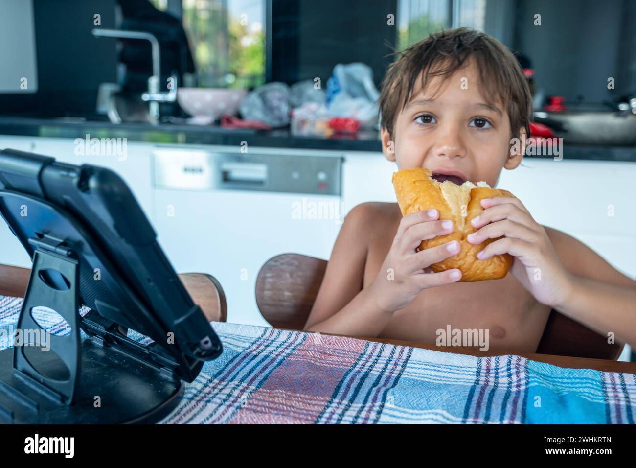 Fat boy eating hi-res stock photography and images - Alamy