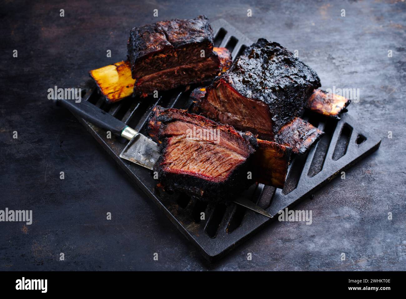 Traditional barbecue burnt chuck beef ribs marinated with spicy rub and ...