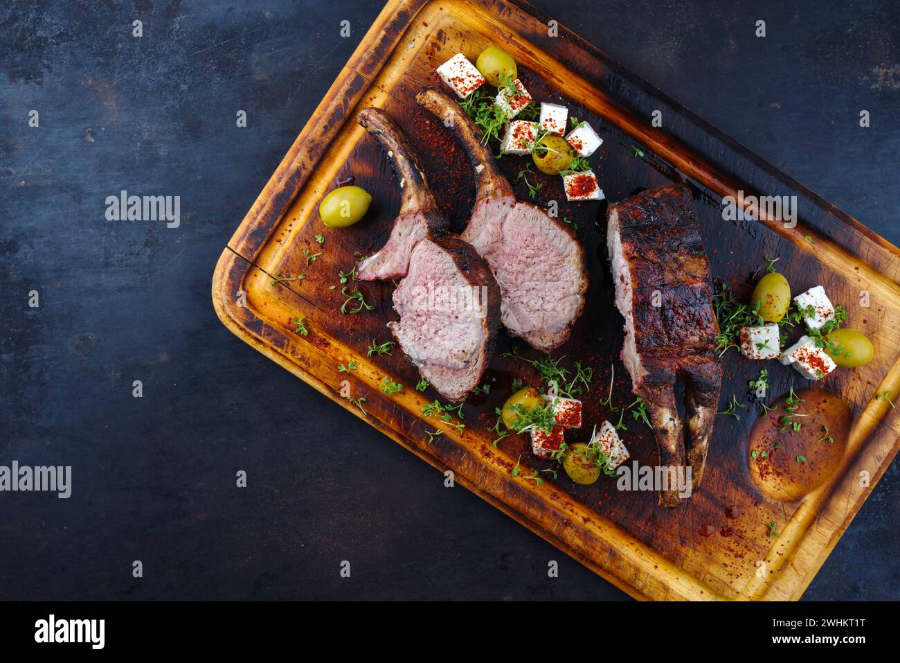 Traditional grilled Duroc pork loin with Greek feta cheese and olives ...