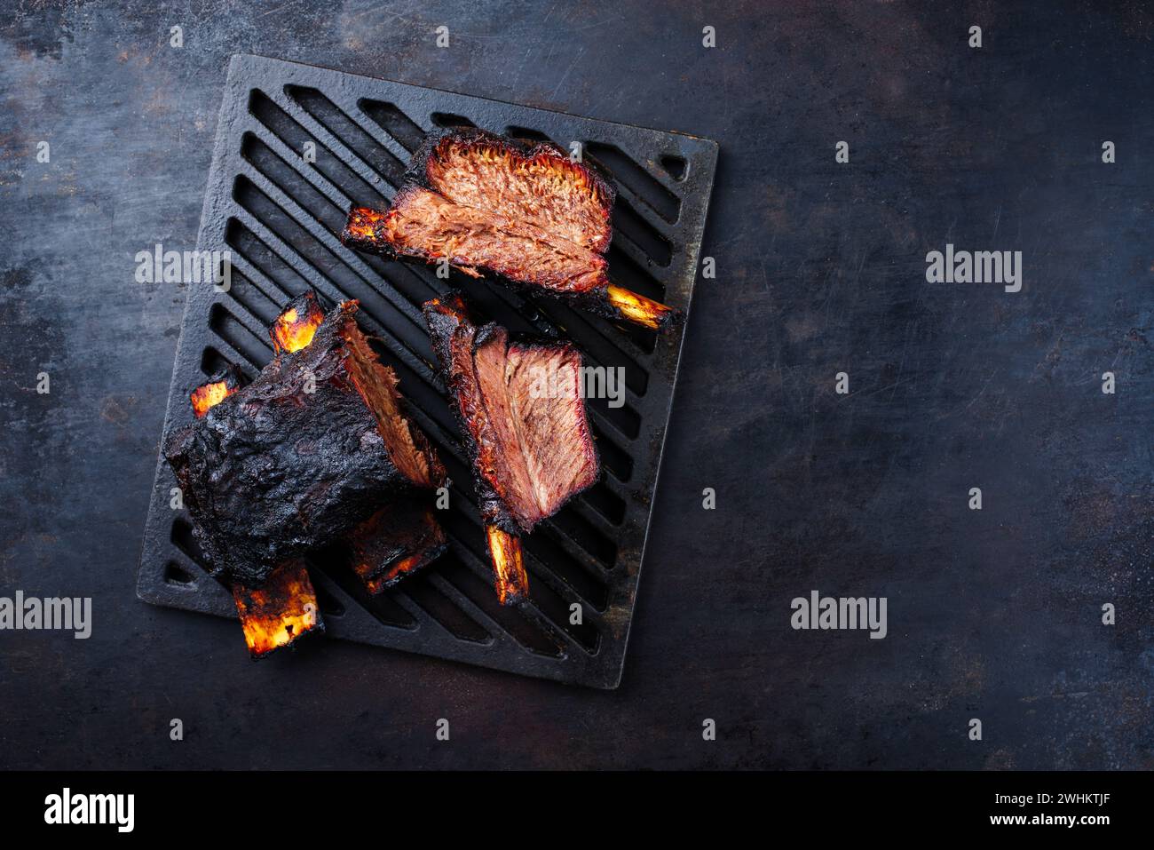 Traditional barbecue burnt chuck beef ribs marinated with spicy rub and ...