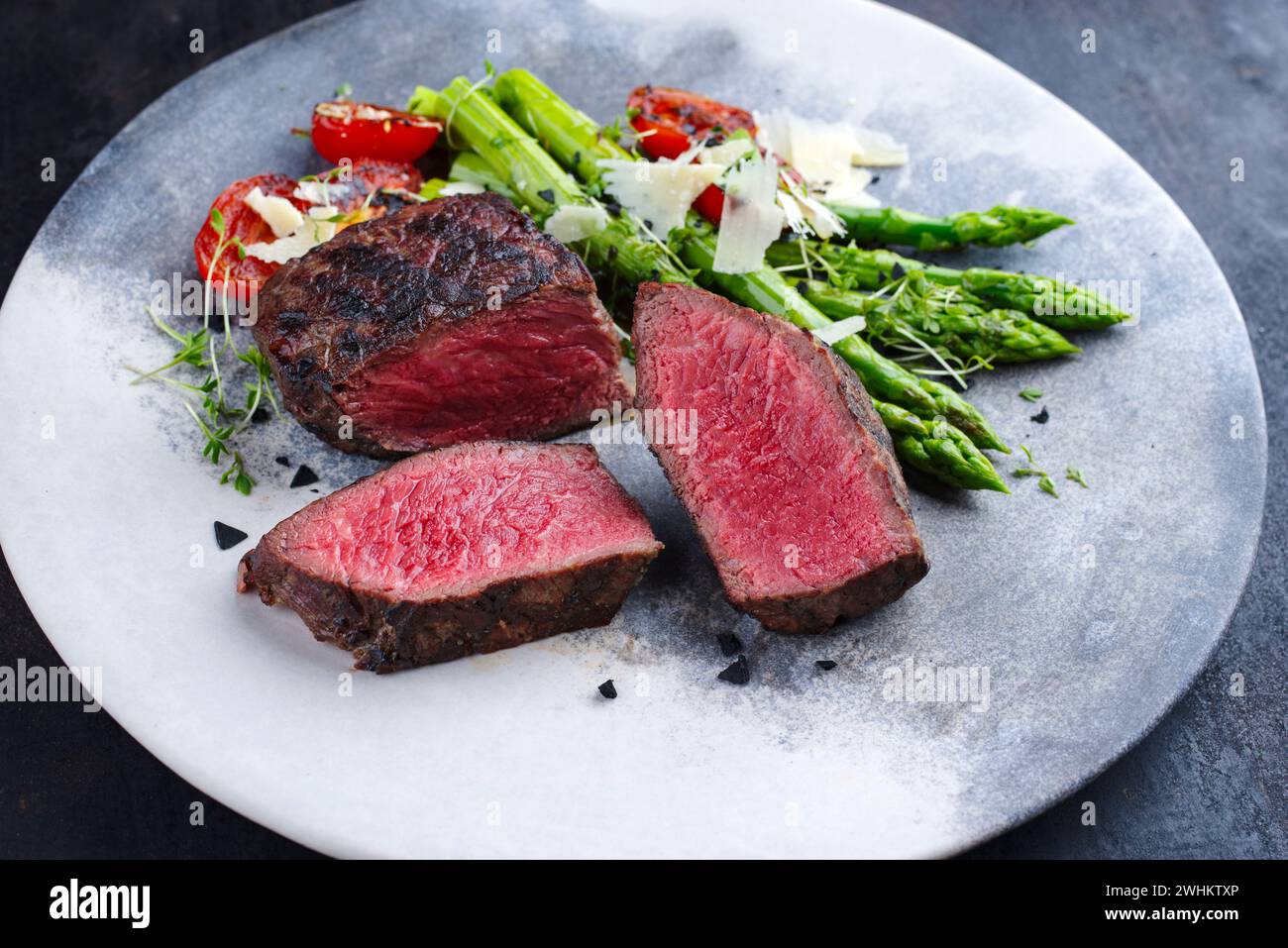 Italian barbecue dry aged chianina beef steak with green asparagus ...