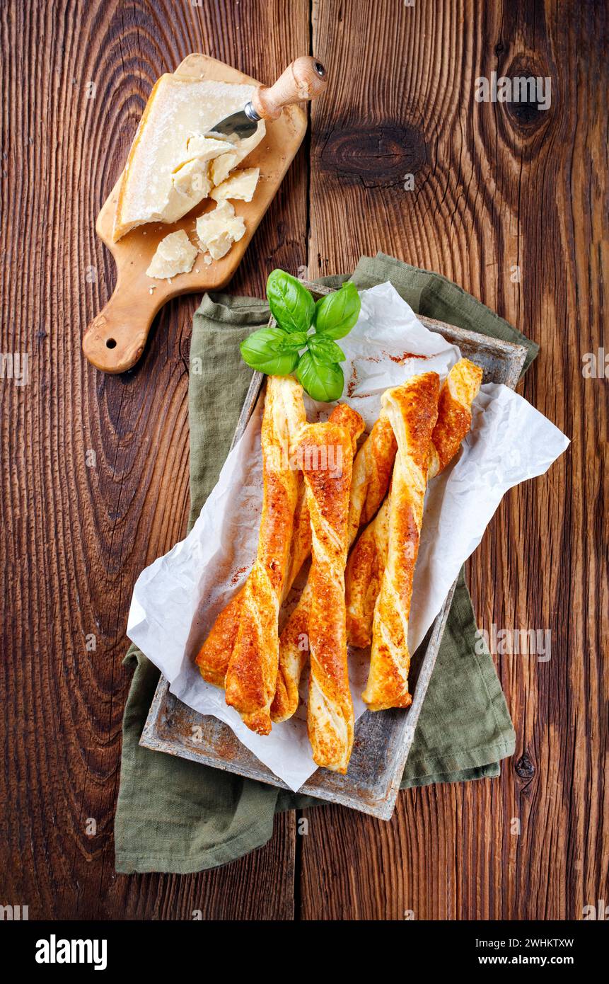 Traditional Italian parmesan cheese puff pastry sticks as a grilled ...