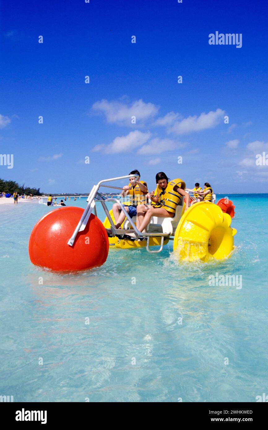 Central America, Caribbean, children with water buggy, Bahamas Stock ...