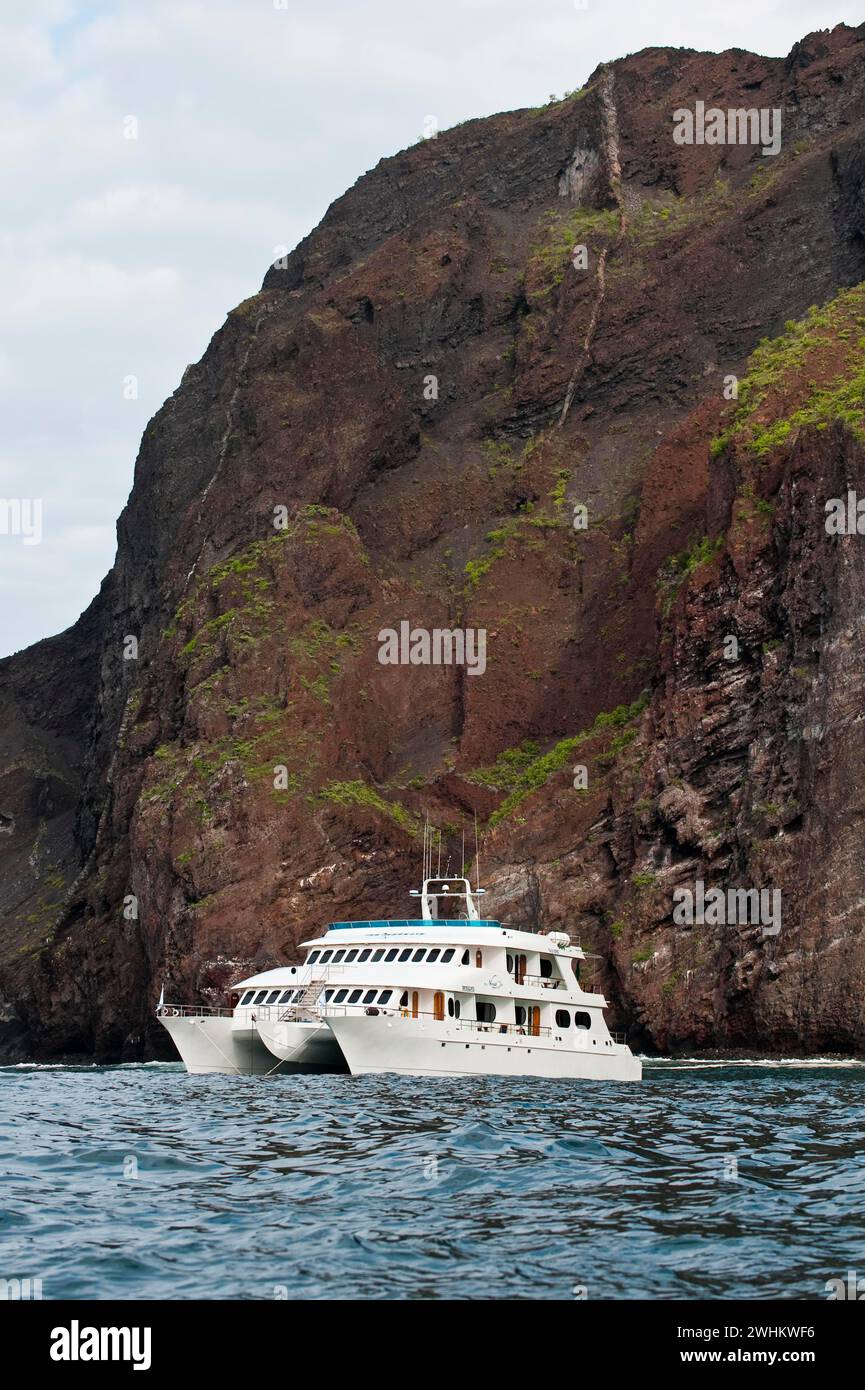 Excursion boat off Vincente Roca Point, Isabela Island, Ecuador, South ...