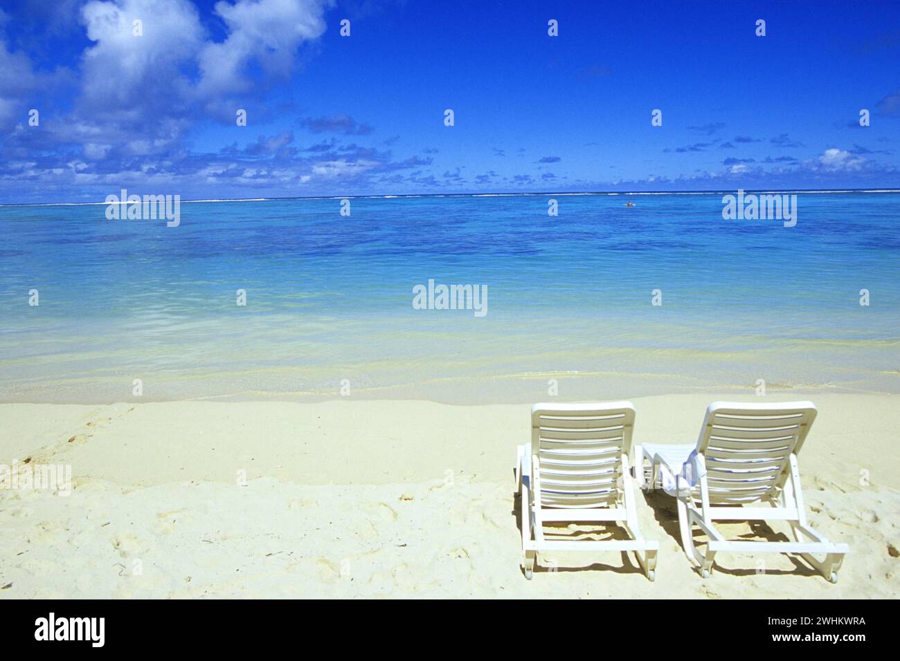 Palm beach, Cook Islands, sun lounger Stock Photo - Alamy
