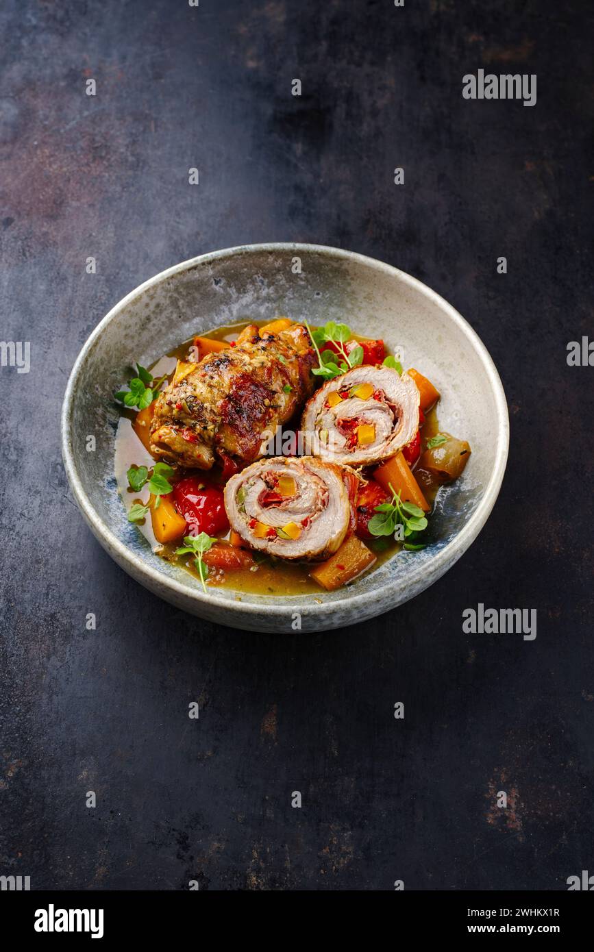 Traditional slow cooked German pork roulades with vegetable and bacon ...