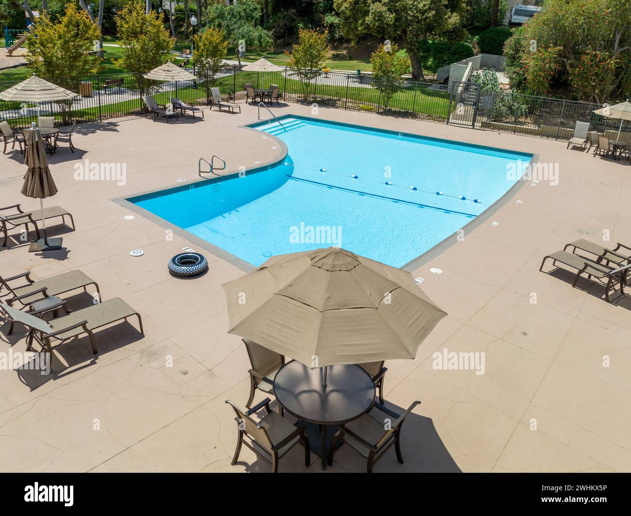 Aerial view of recreational facilities with pool in private residential ...