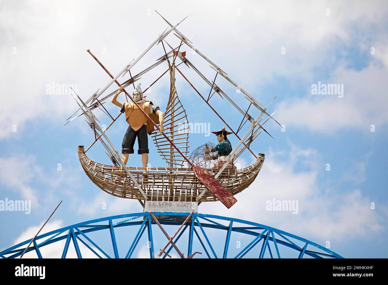 Peruvian fishing sculpture at the entrance to the village of Huatta on ...