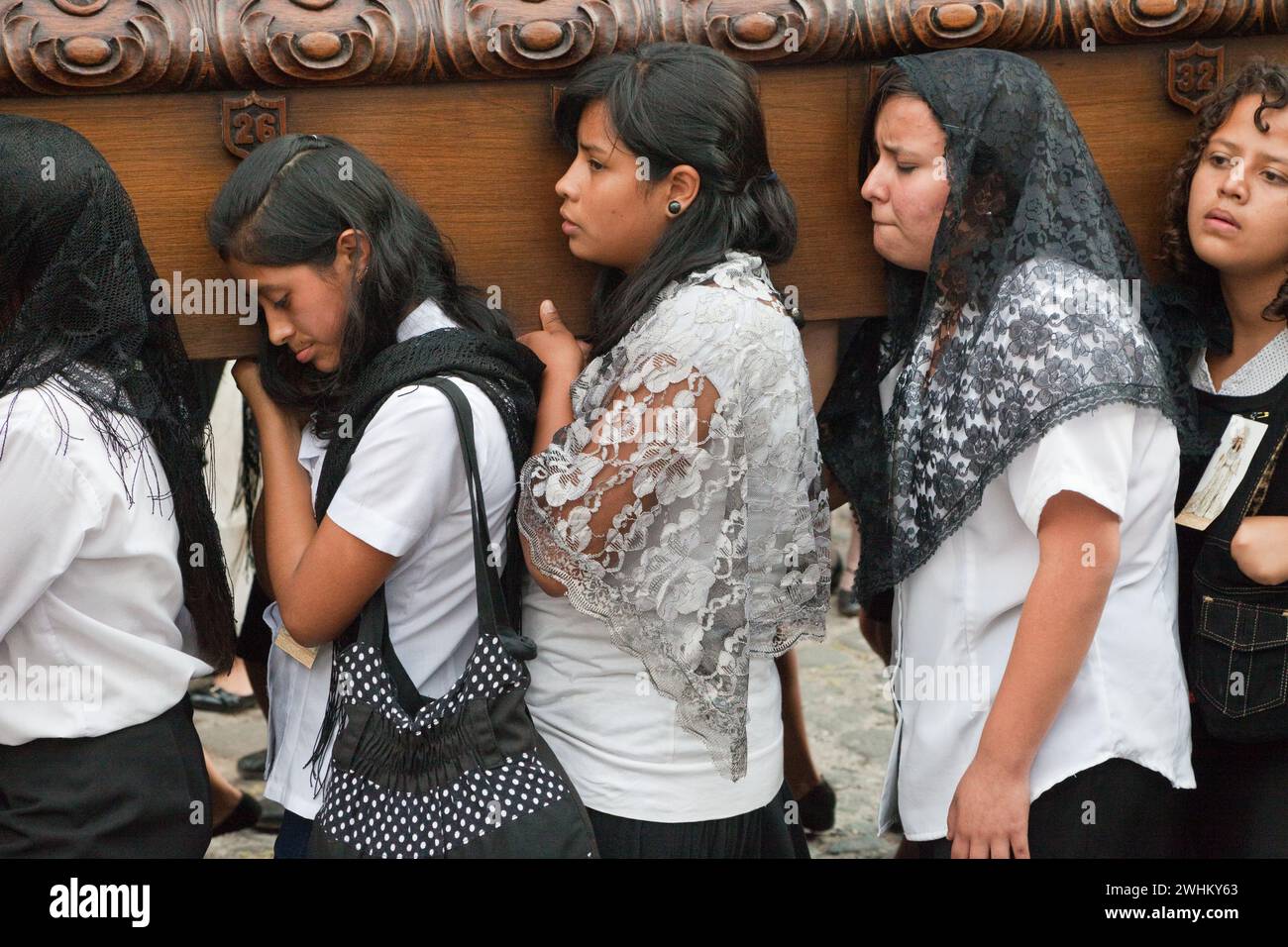 Antigua, Guatemala. Semana Santa (Holy Week). Strain shows on the faces ...