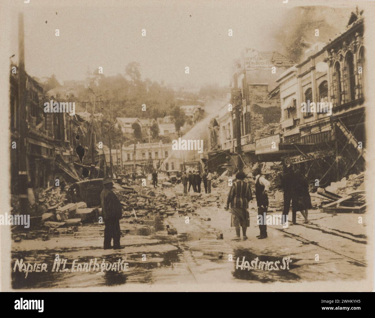 February 3, 1931. Napier New Zealand. People in the street covered with ...