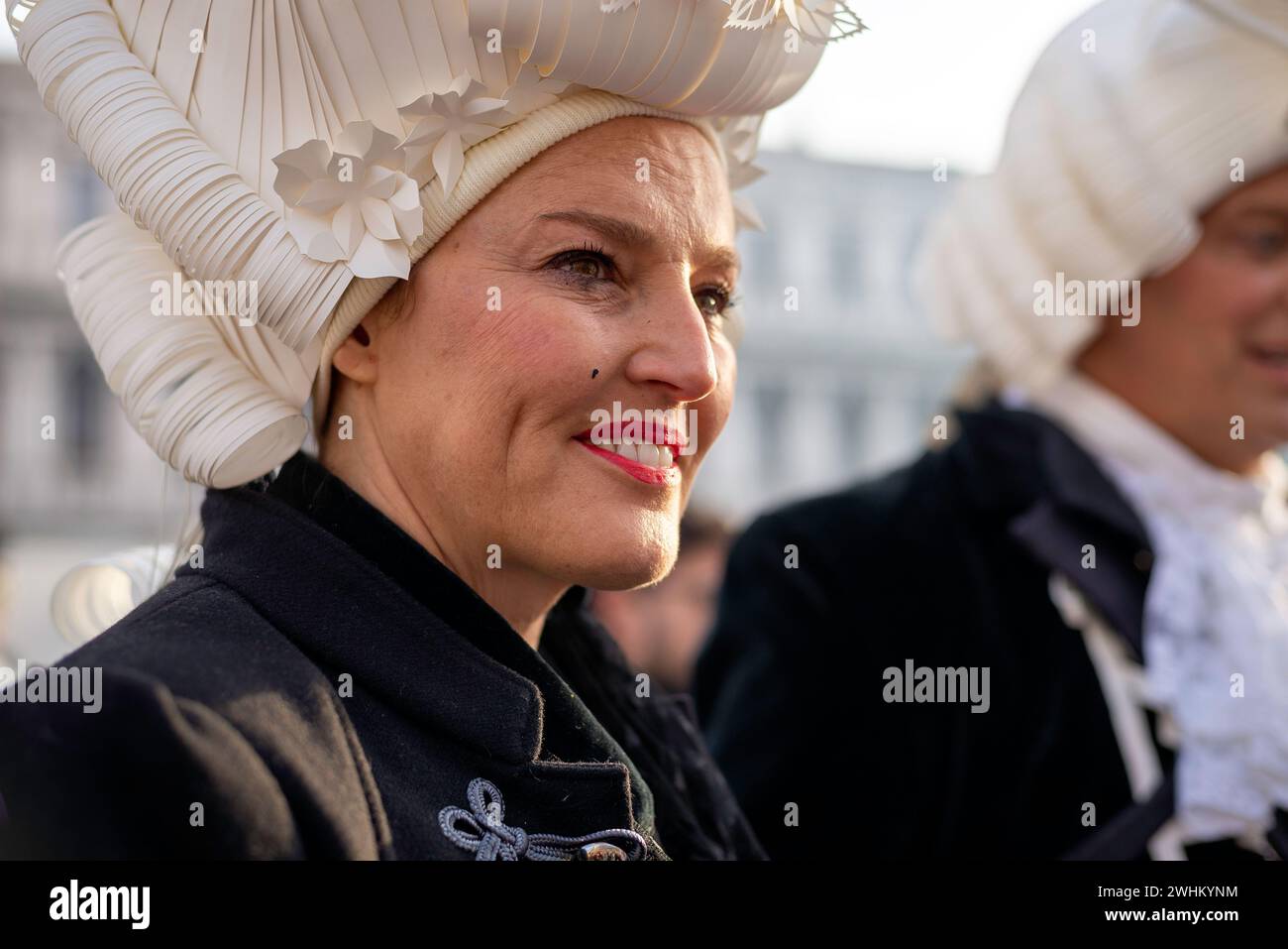Locals and visitors alike dress up in costumes for Venice's famous and ...