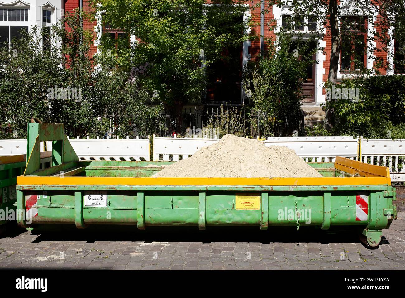 Container, skip for building rubble standing on the road, building site ...