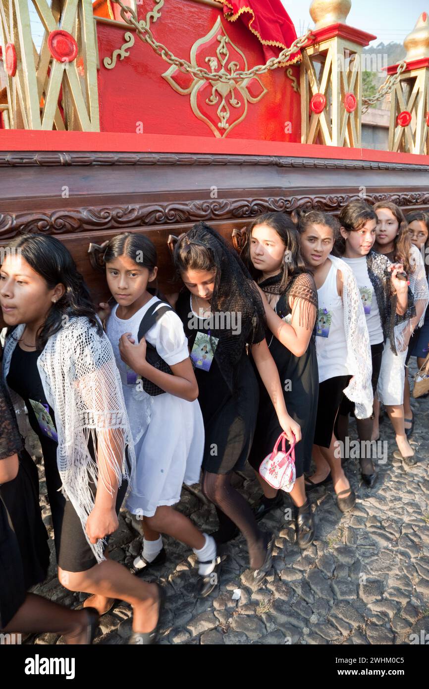 Antigua, Guatemala. Semana Santa (Holy Week). Young Girls Carrying an ...