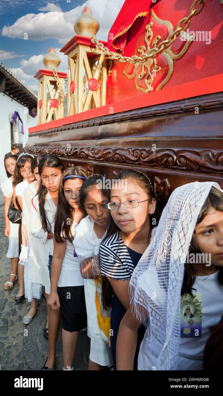 Antigua, Guatemala. Semana Santa (Holy Week). Young Girls Carrying an ...