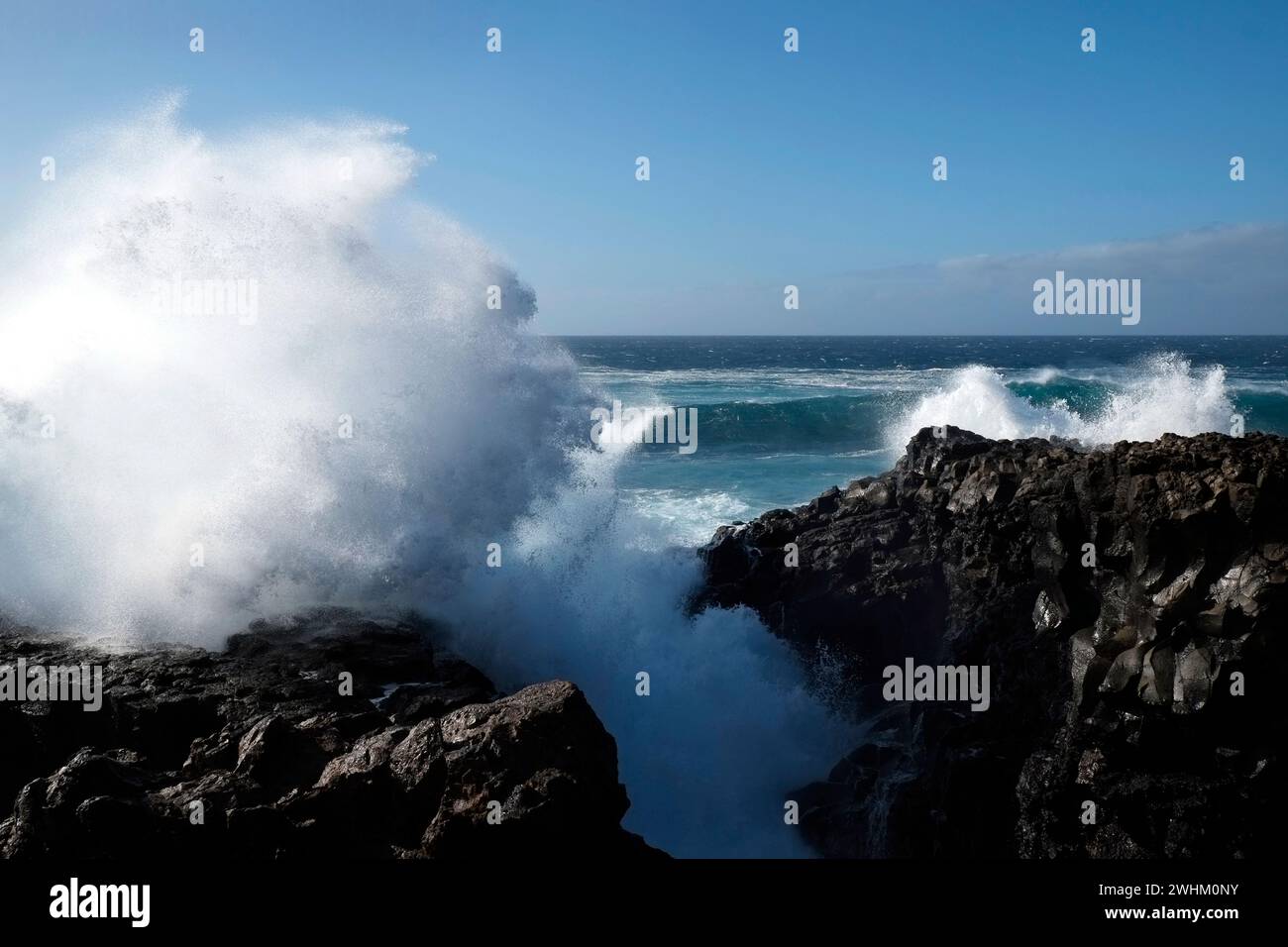 Foaming sea spray Stock Photo - Alamy