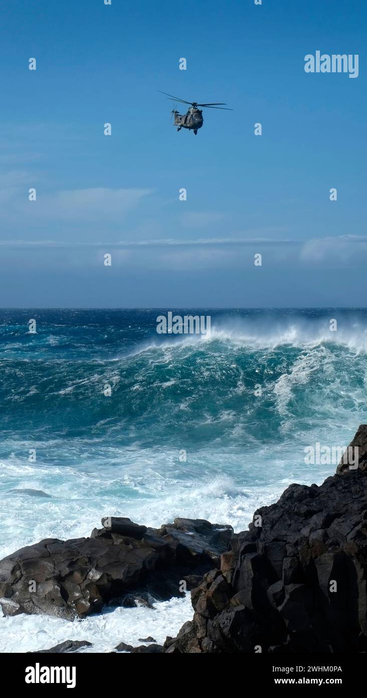 Maritime emergency helicopter above the waves Stock Photo - Alamy