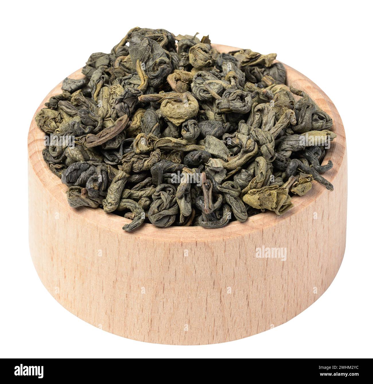 Twisted dry green tea leaves, healthy drink Stock Photo - Alamy