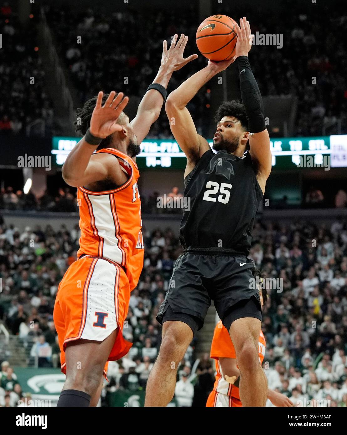 Michigan State forward Malik Hall (25) shoots over the the defense of ...