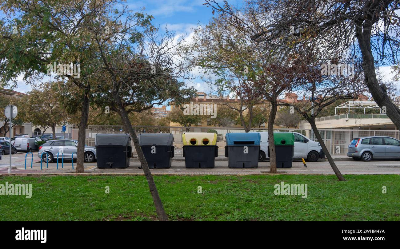 Public Recycling Bins Lined Up on an Urban Sidewalk Stock Photo - Alamy