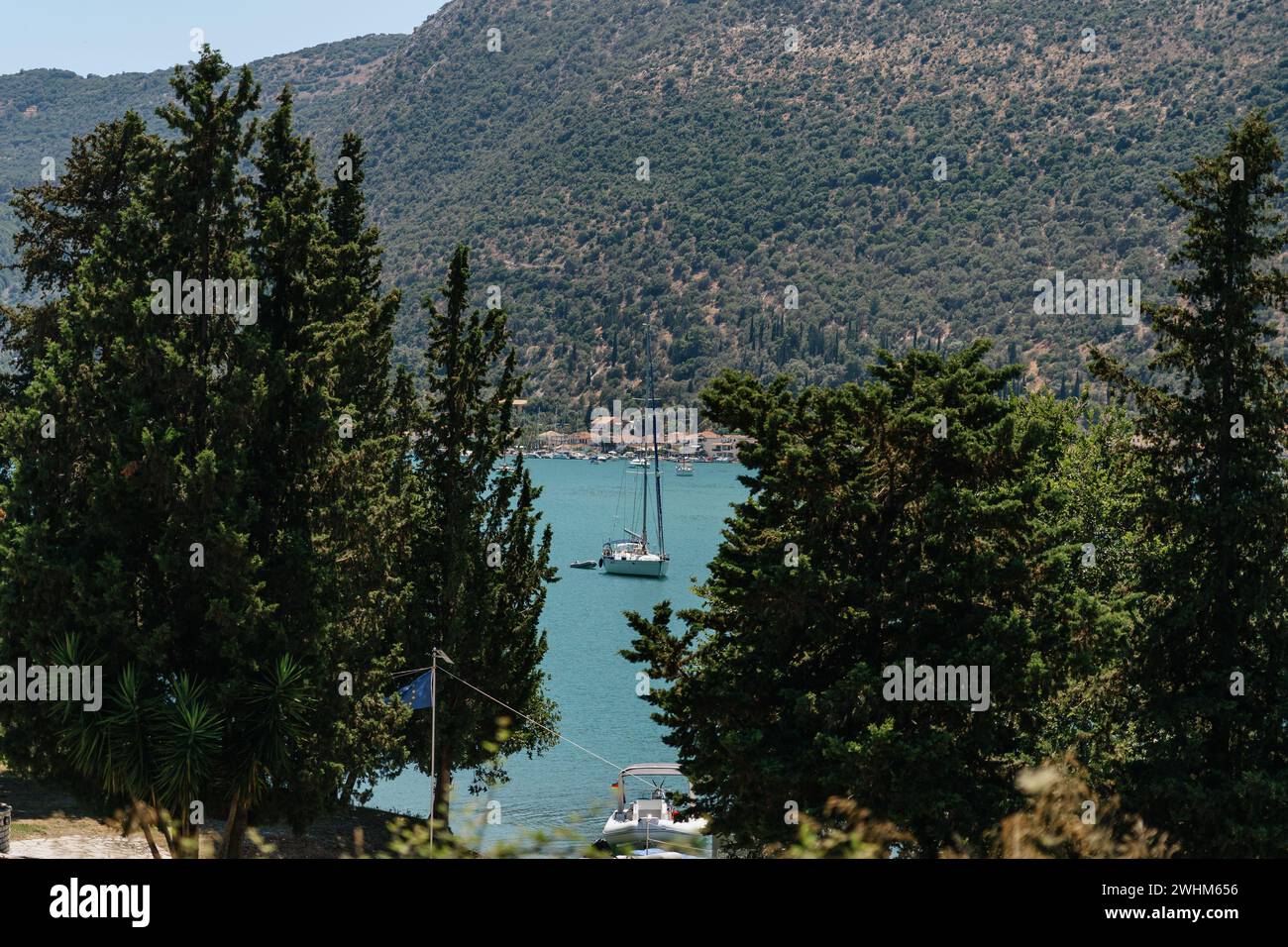Secluded Cove with Sailing Yacht Stock Photo - Alamy