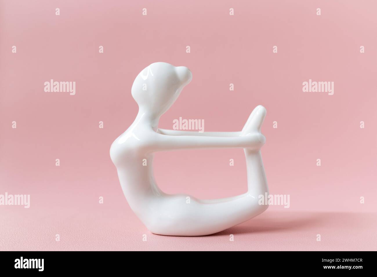 Ceramic Yoga Figurine of Woman doing yoga pose, Dhanurasana Bow Pose on ...