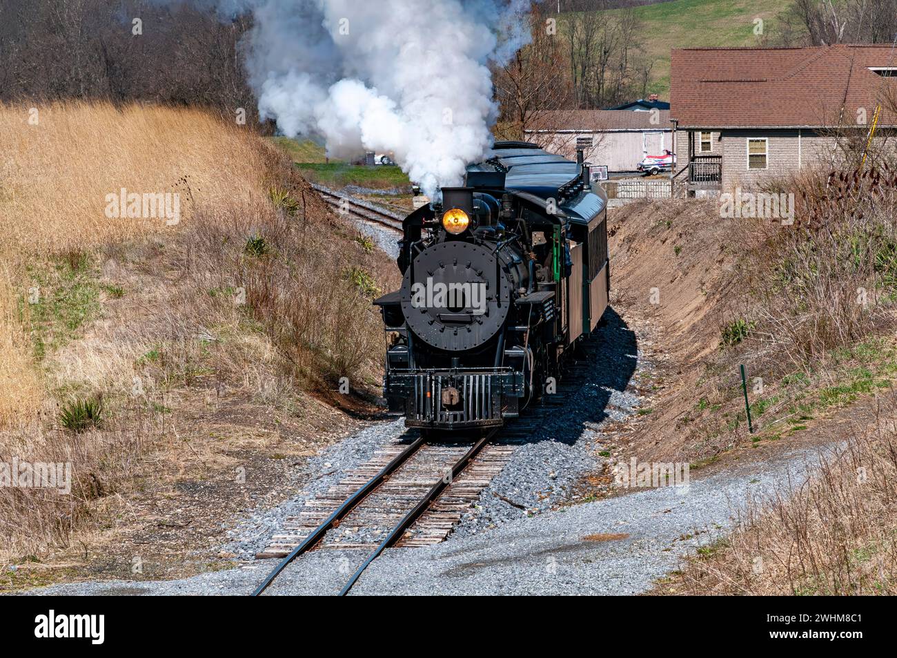 Front and Above View of an Approaching Restored Narrow Gauge Passenger ...