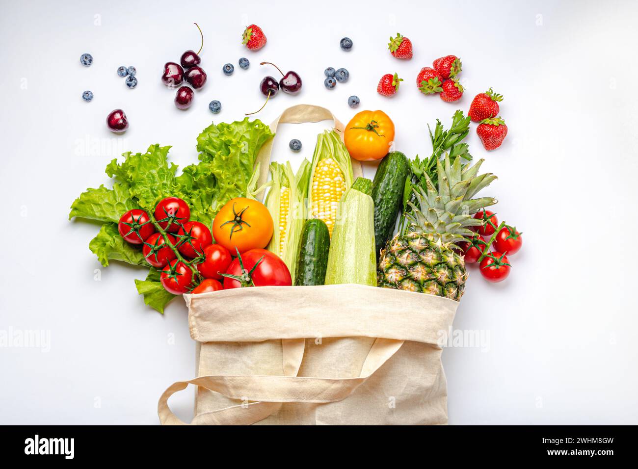 Grocery shopping. Different fresh fruit and vegetables in a textile ...