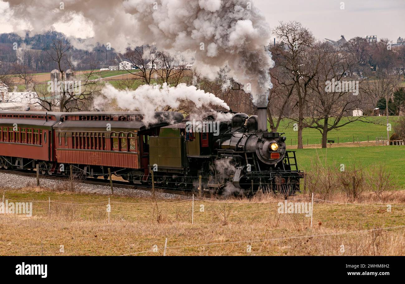 A View of a Restored Steam Passenger Train Approaching Traveling Thru ...