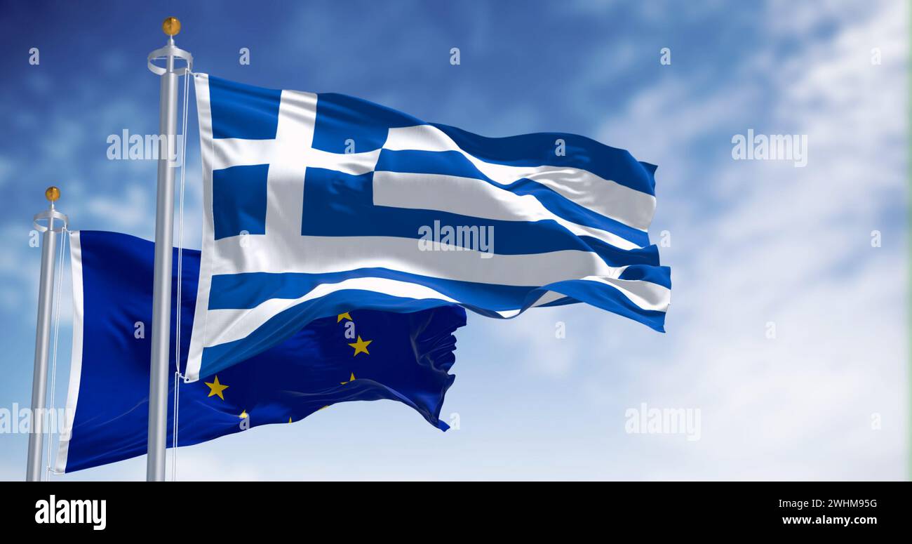 Flags of Greece and the European Union waving together on a clear day ...