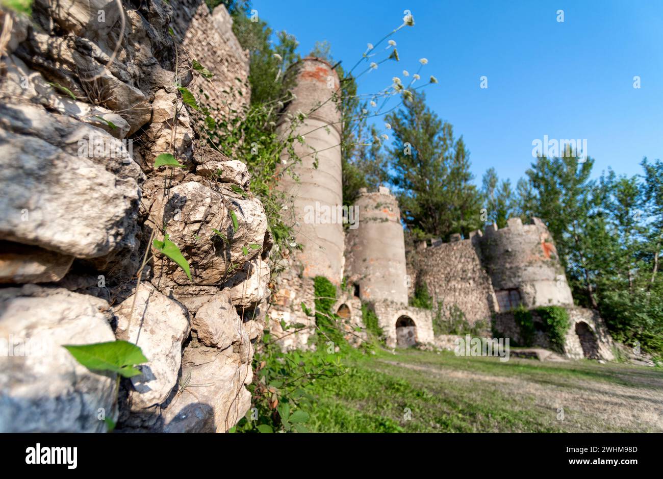 Medieval castle without people in the forest Stock Photo - Alamy