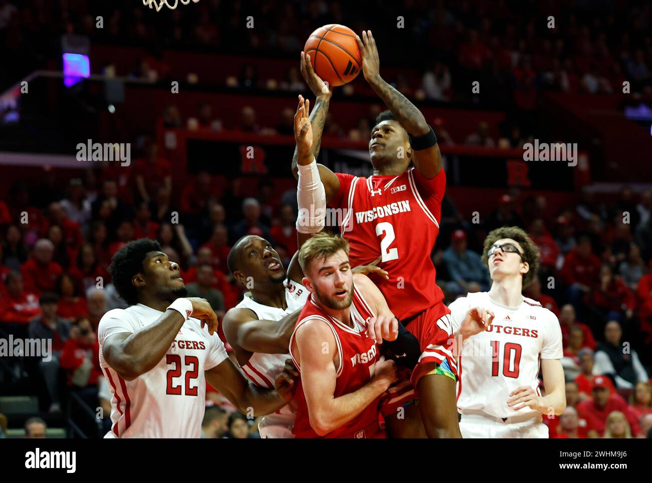 Wisconsin guard AJ Storr (2) drives to the basket against Rutgers ...