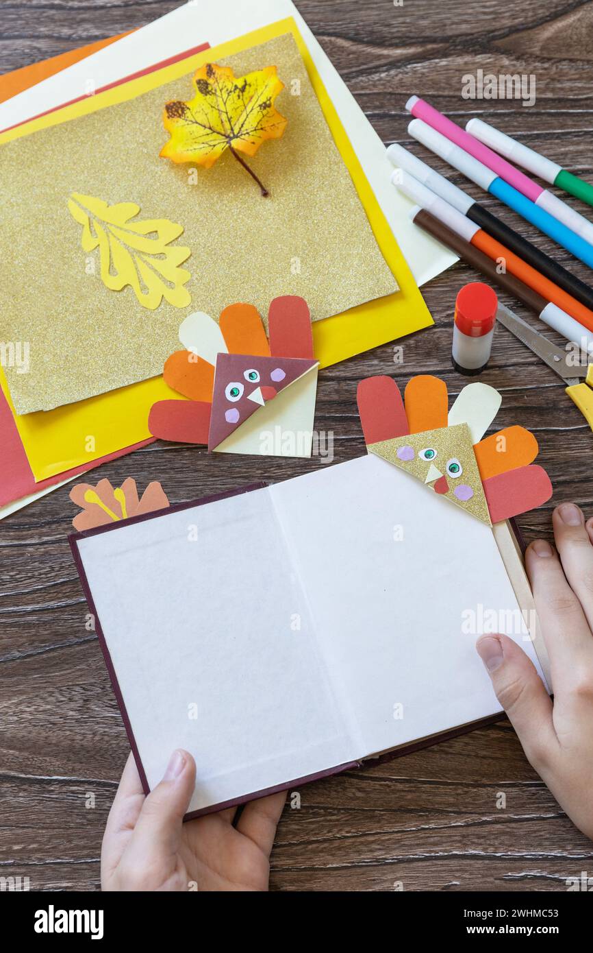 In the hands of a child Thanksgiving craft bookmark turkey paper ...