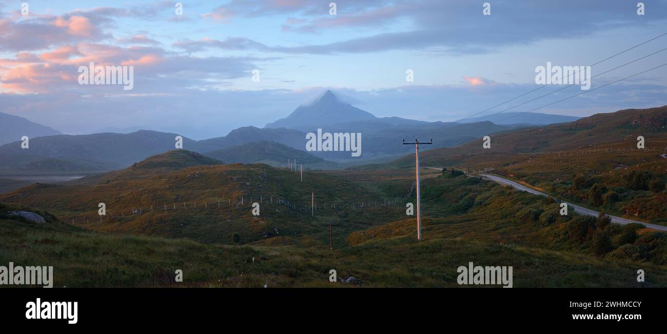 The western slope of Mount Ben Stack and the road through the valley at ...