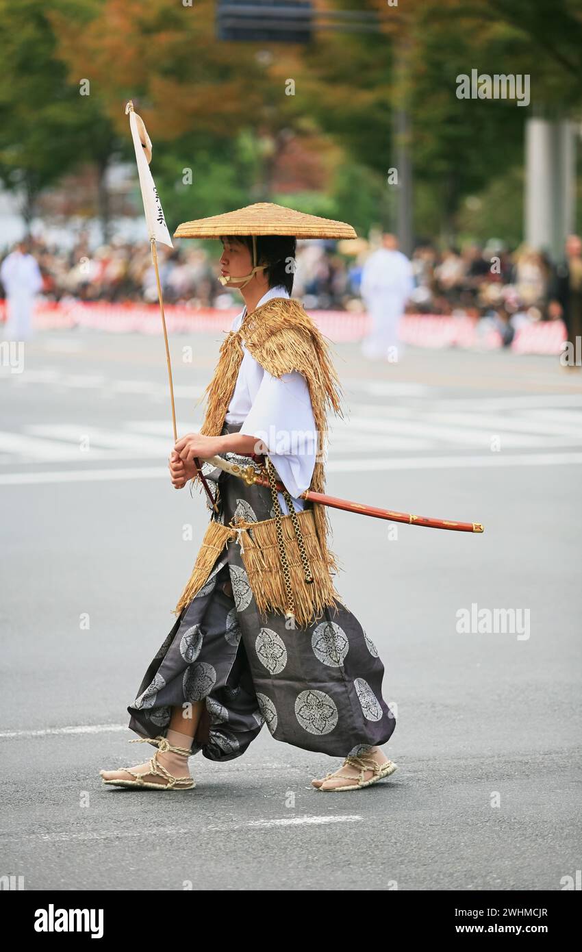 Actor wearing the travelling costume of Imperial minister at the Jidai ...