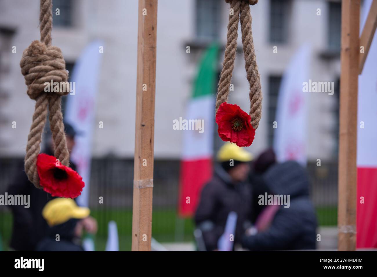 Nooses with red roses are displayed during the Anglo-Iranian community ...