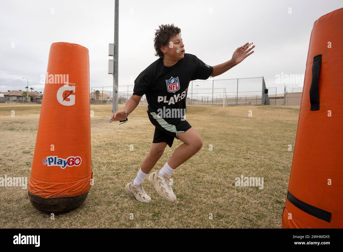 Students participate during NFL PLAY 60 clinic at B. Mahlon Brown ...