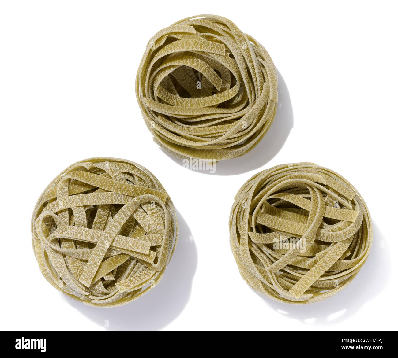 Raw green pasta nest hi-res stock photography and images - Alamy