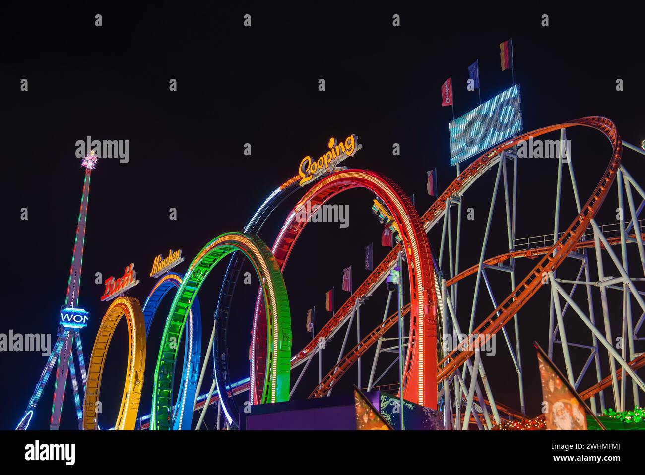 Experience the Vibrant Christmas Fair's Roller Coaster at Night in ...