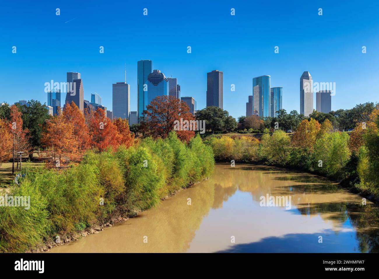 Houston skyline at sunny autumn day in Buffalo Bayou Park, Houston ...