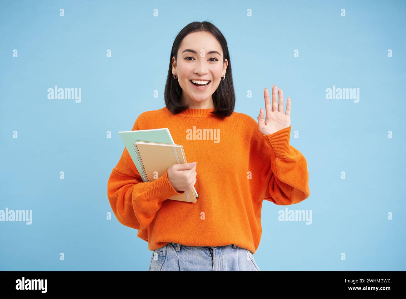 Woman hello, stands hi-res stock photography and images - Alamy