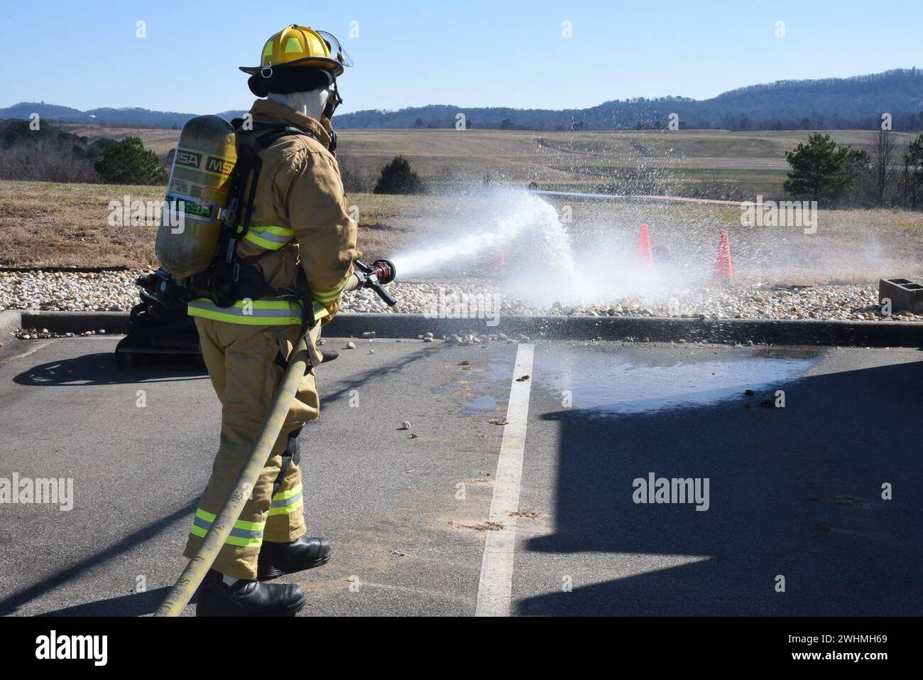 Members of the 117th Air Refueling Wing Fire Department practice fire ...