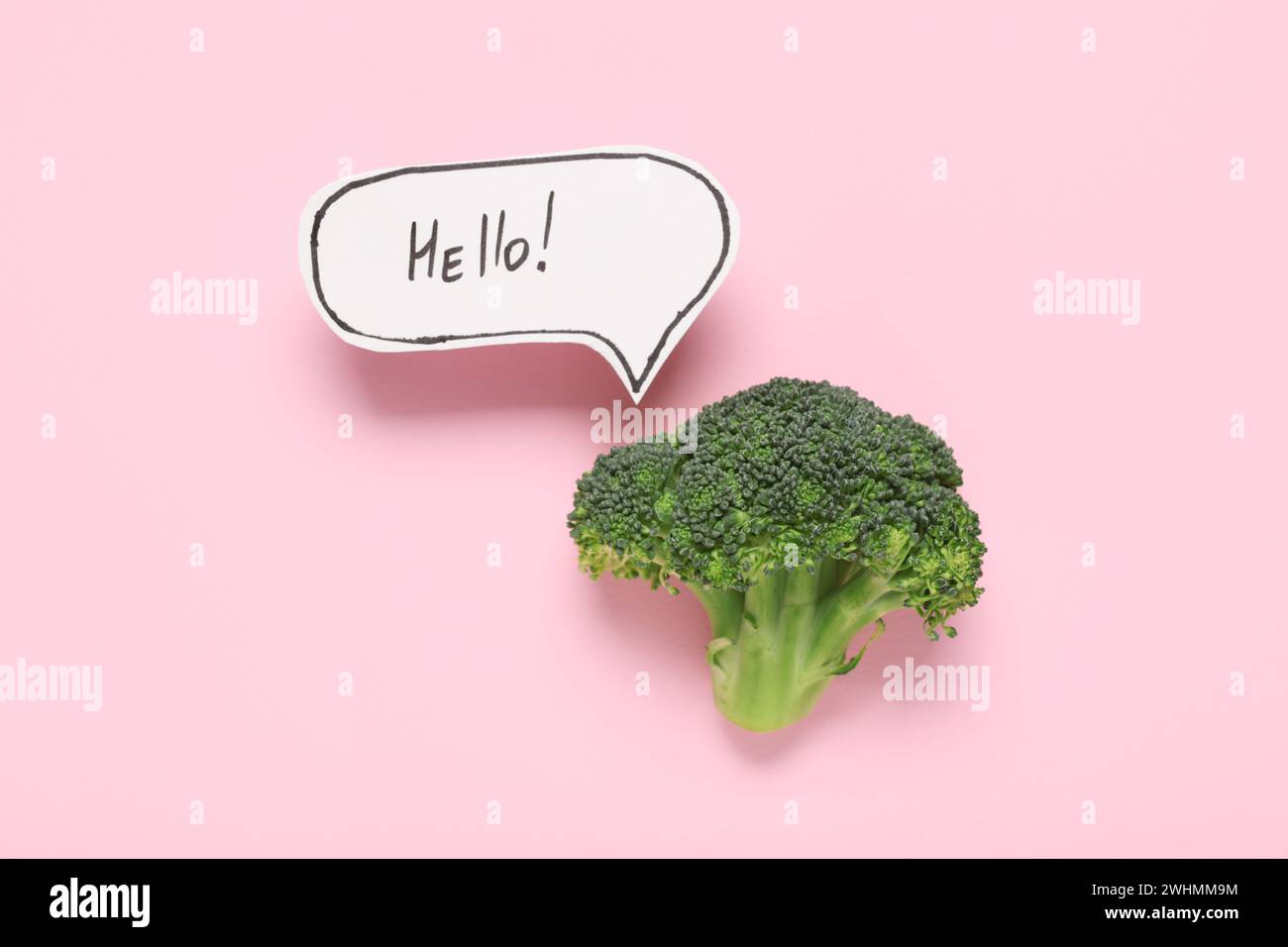 Fresh broccoli cabbage with text HELLO on pink background Stock Photo ...