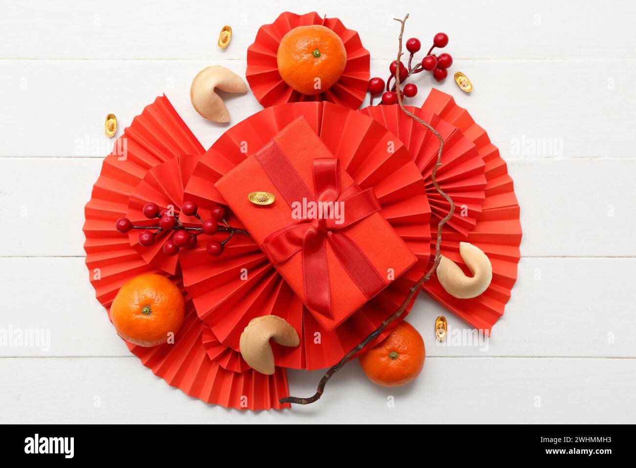 Gift box with fortune cookies, mandarins and Chinese symbols on white ...