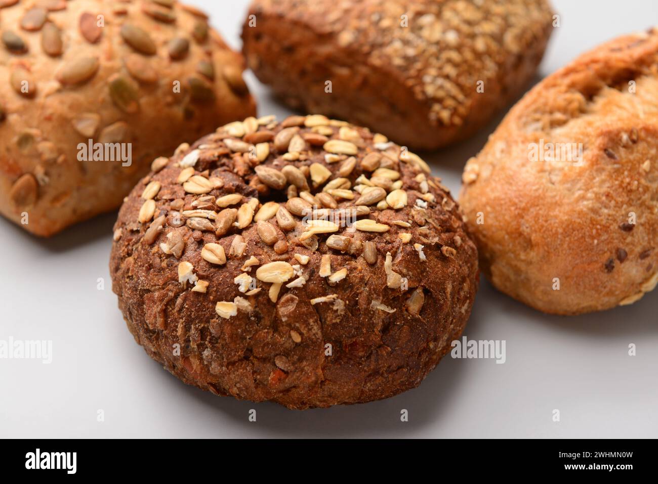 Different delicious buns on white background Stock Photo - Alamy