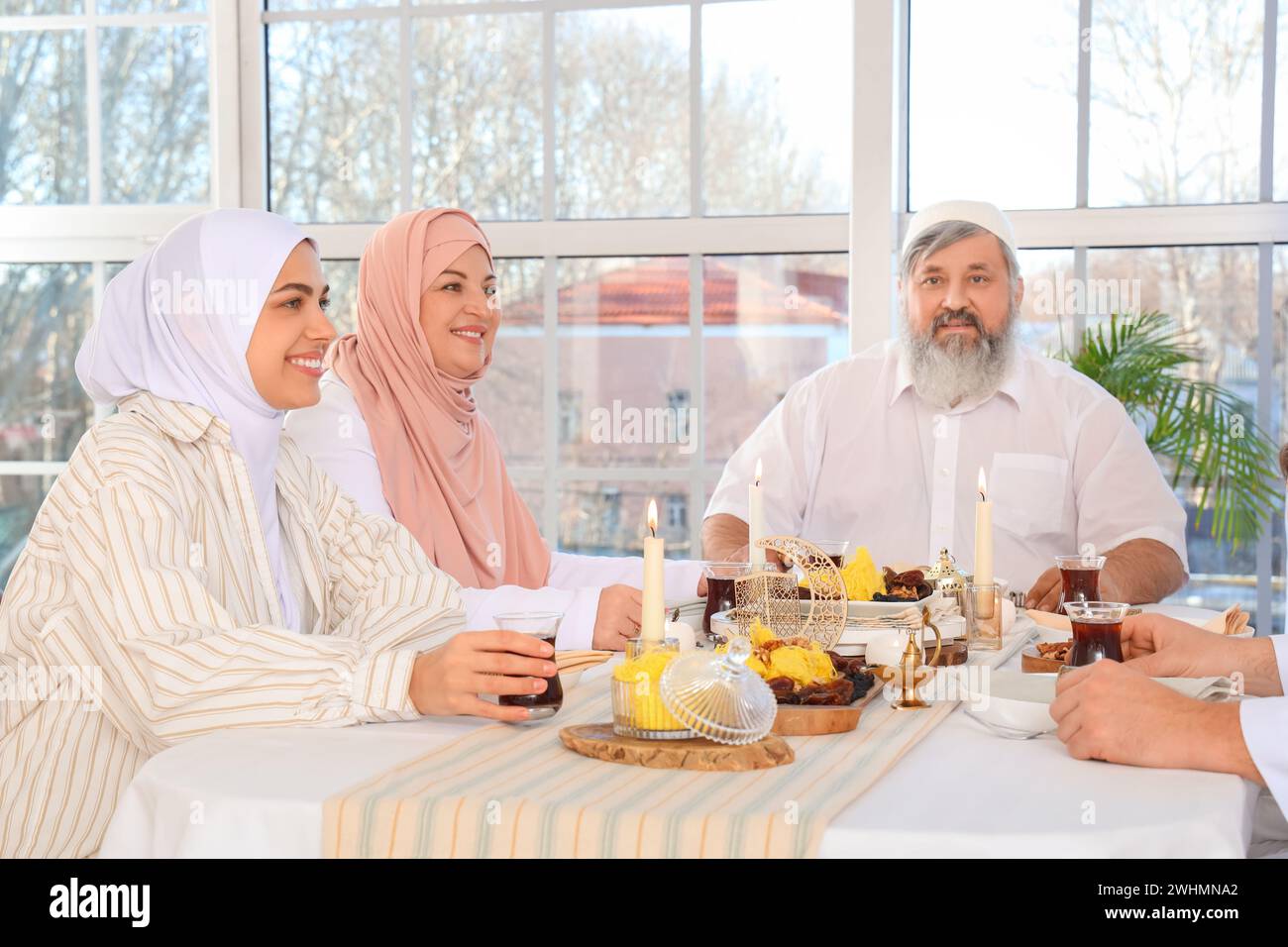 Muslim family eating dinner ramadan hi-res stock photography and images ...