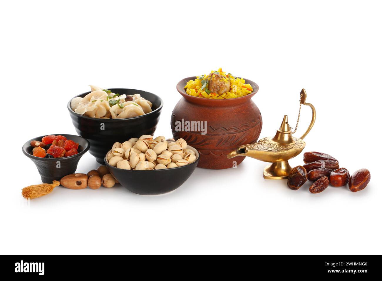 Traditional Eastern dishes, prayer beads and Aladdin lamp of wishes on ...