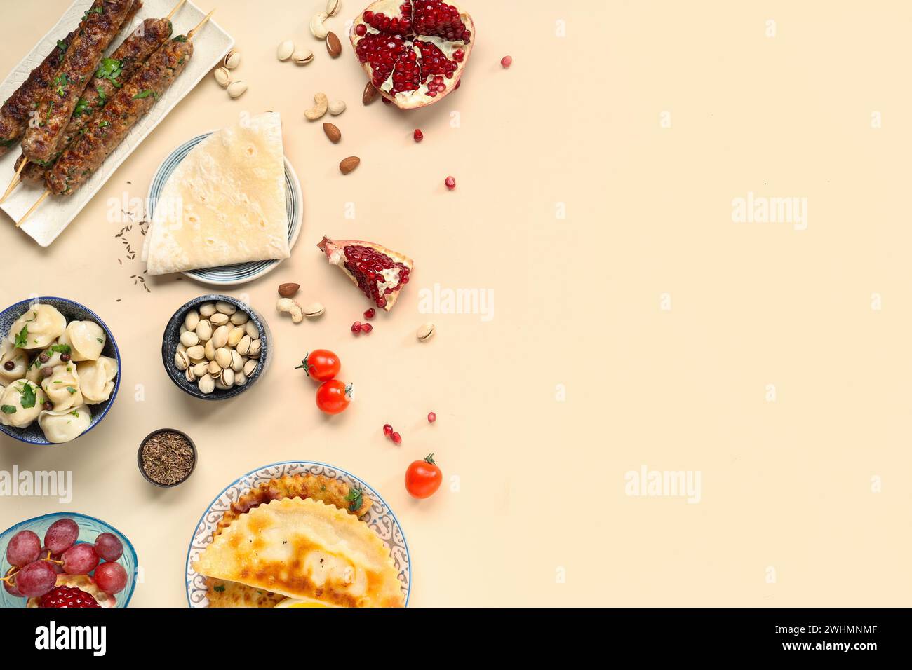 Traditional Eastern dishes on beige background. Ramadan celebration ...