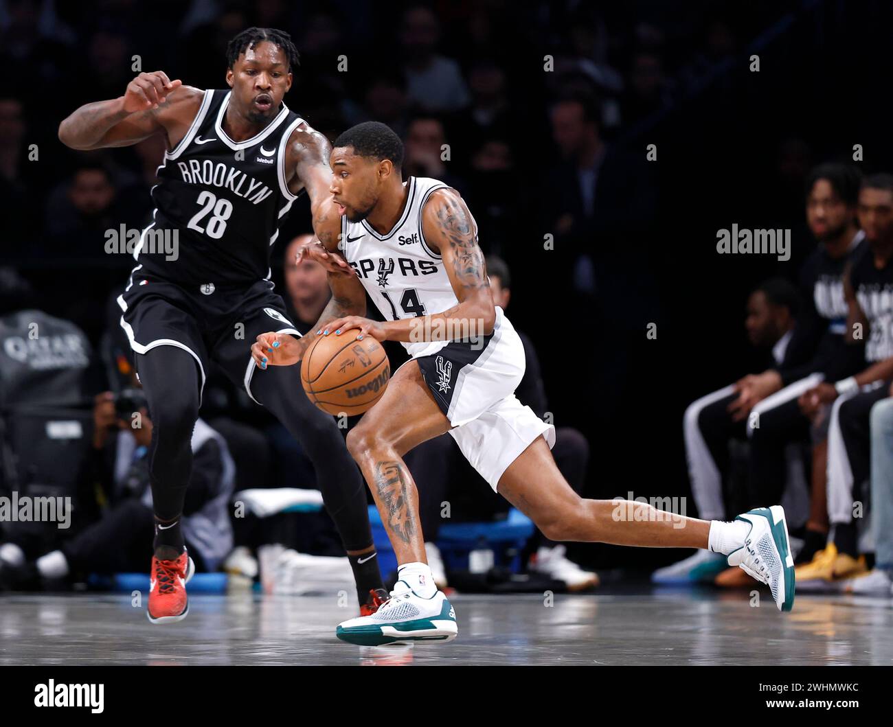 San Antonio Spurs guard Blake Wesley (14) drives to the basket against ...