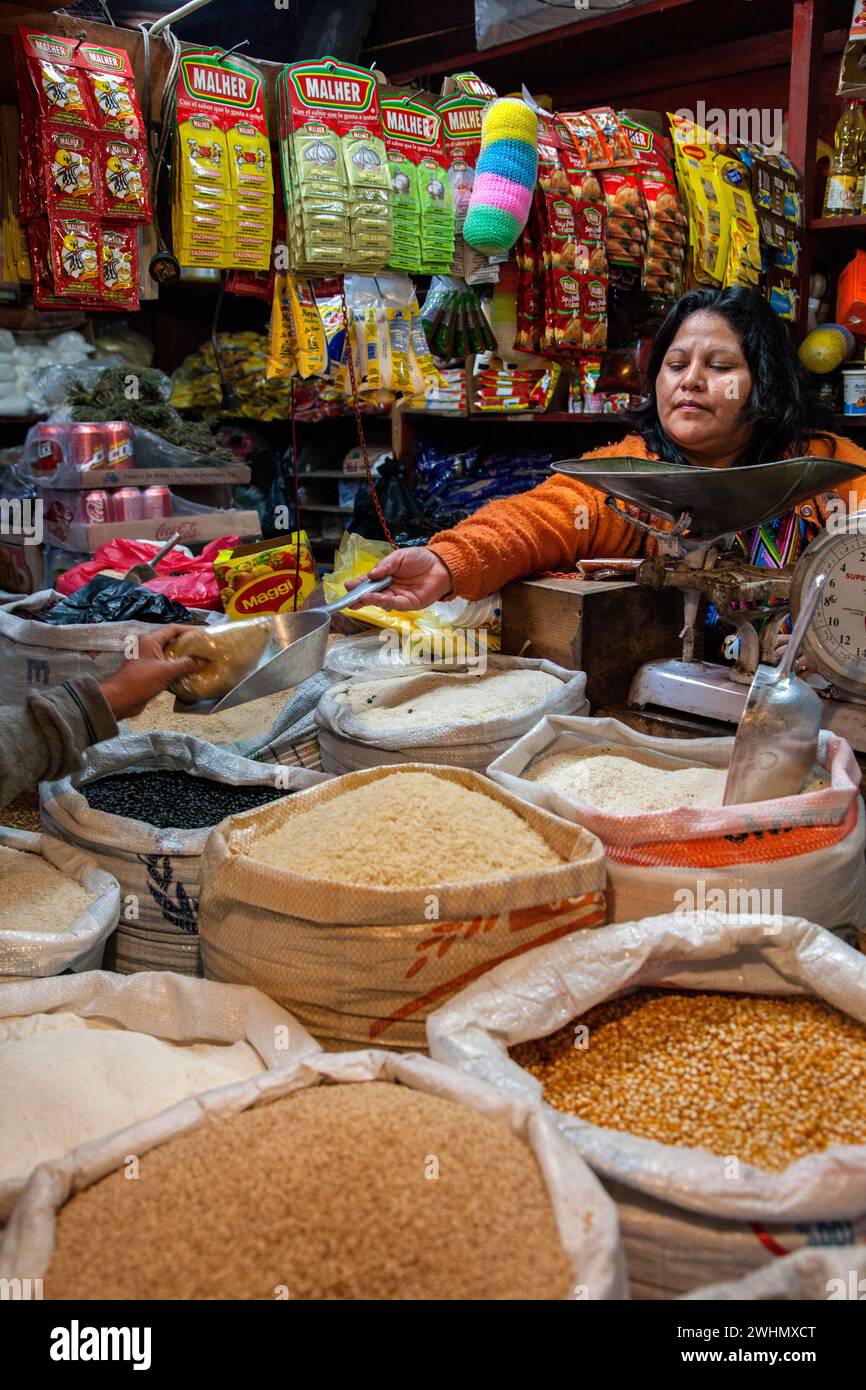 Chichicastenango, Guatemala. Vendor of Rice and Grains Giving a Package ...